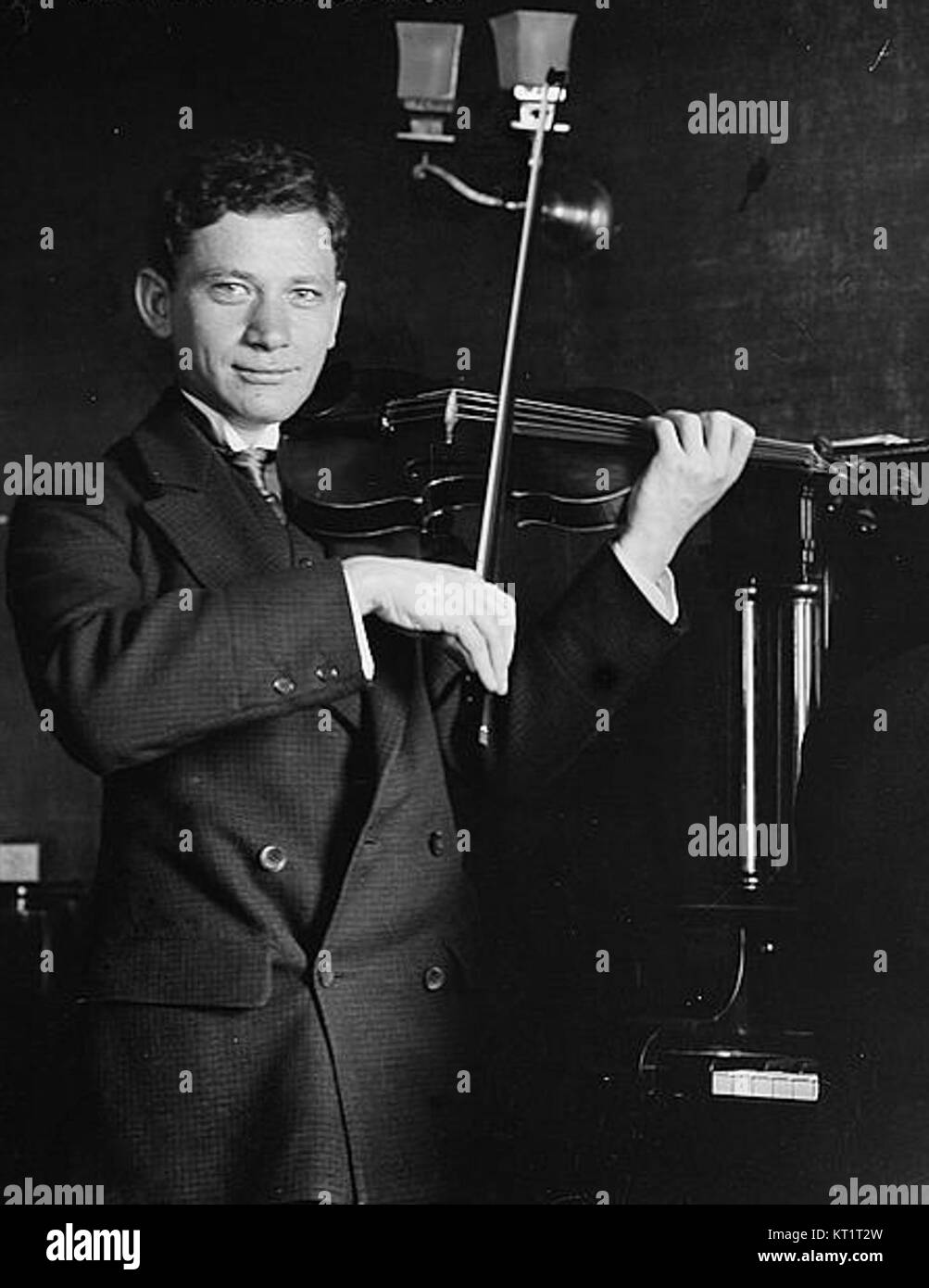 A photograph of Efrem Zimbalist, a renowned violinist, performing on ...