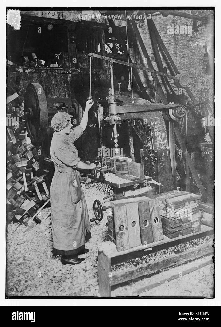 This photograph, titled 'English Woman Worker,' captures an individual ...