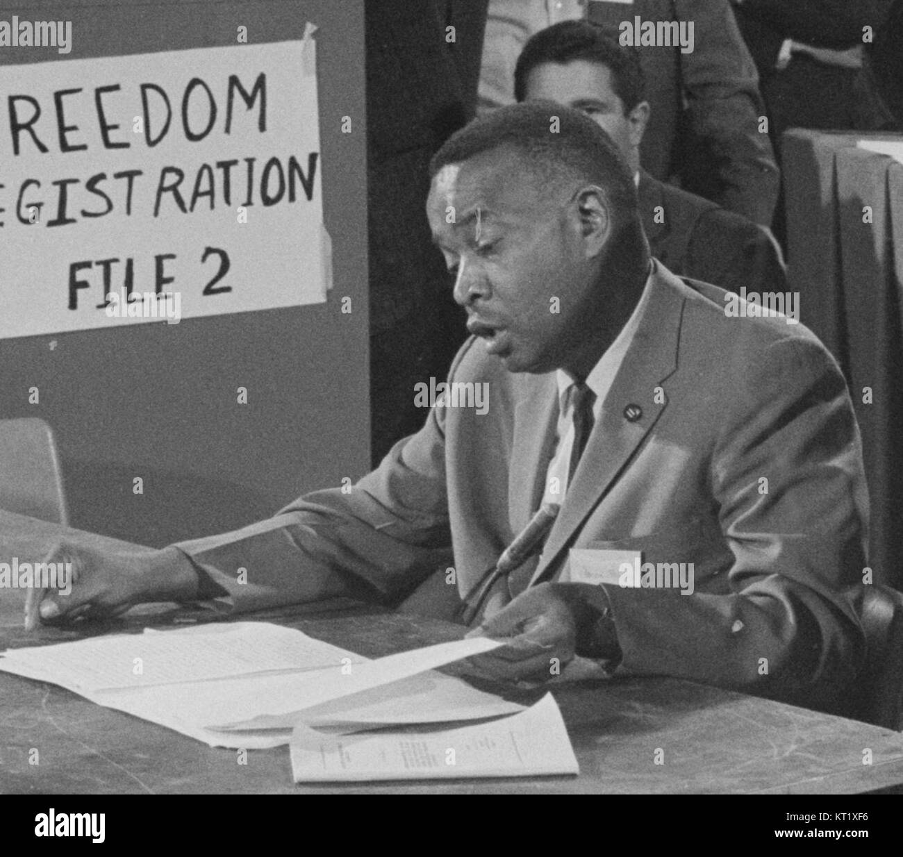 The image is a cropped photograph of Aaron Henry from 1964, a key ...