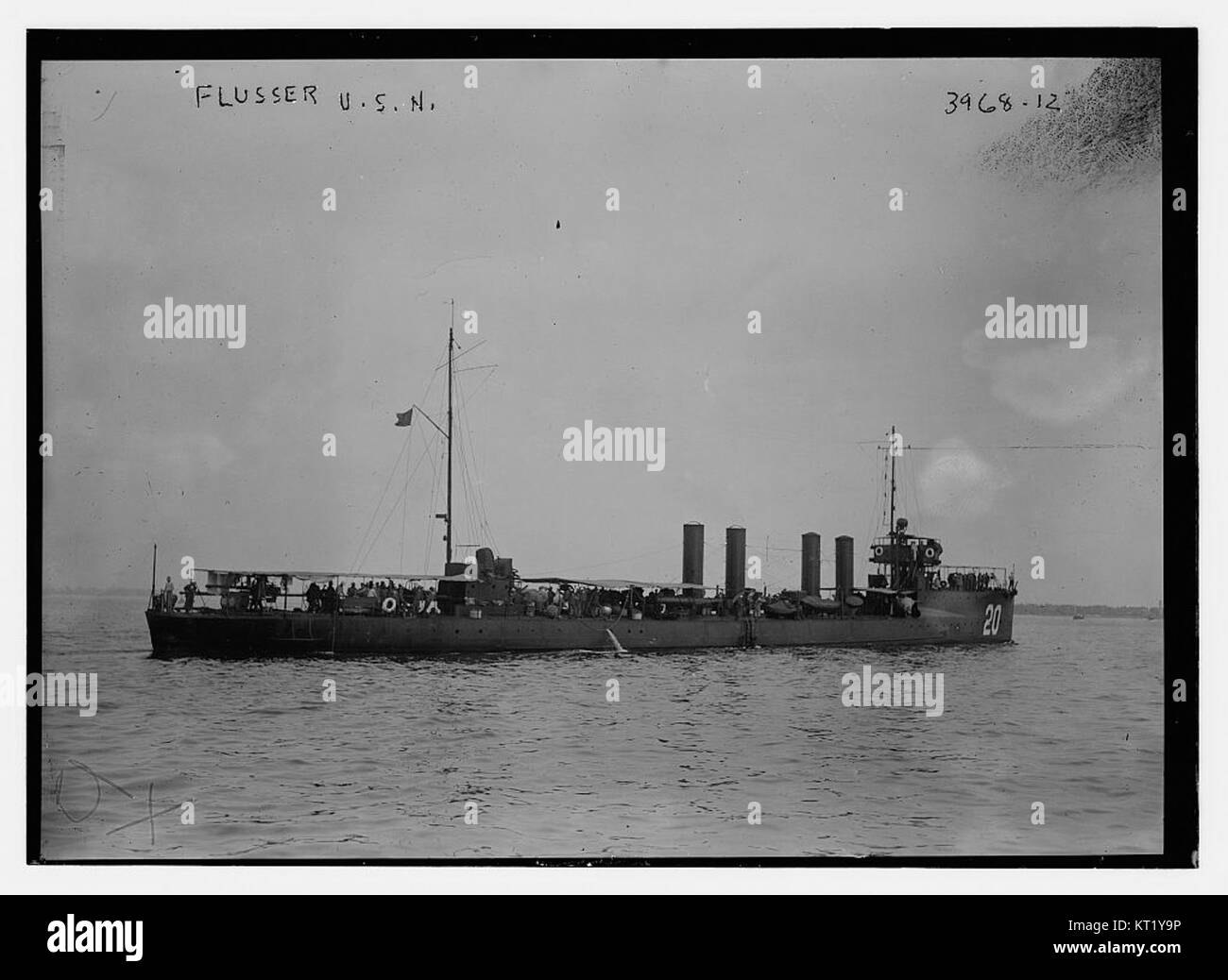 This image shows FLUSSER, a member of the U.S. Navy, capturing a moment ...
