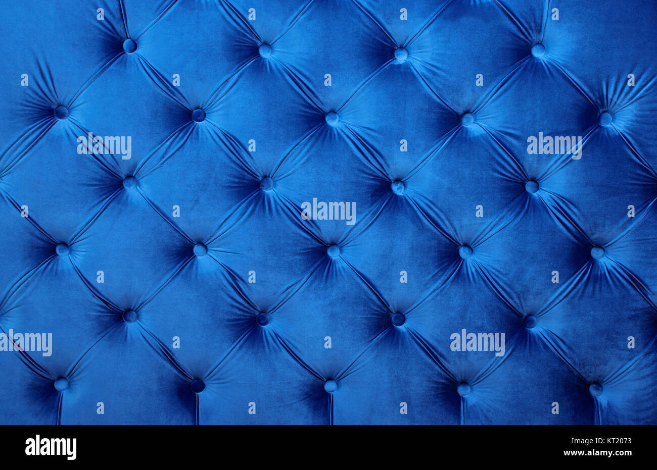 Blue capitone tufted fabric upholstery texture Stock Photo - Alamy