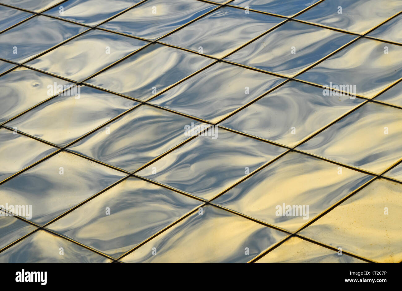 Golden blue metal roof tiles texture background Stock Photo - Alamy