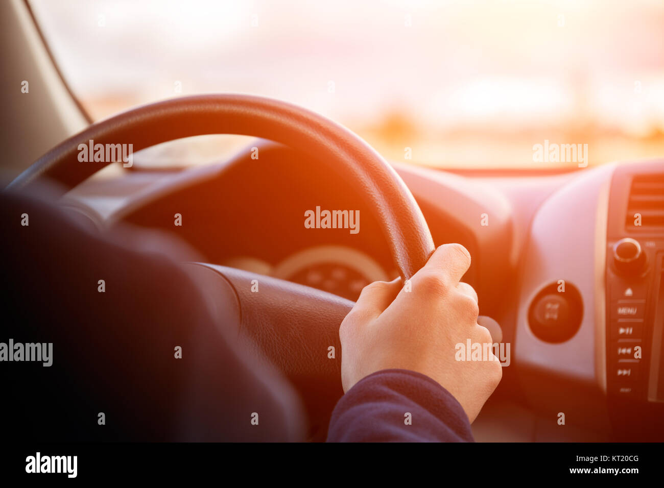 Driving car hands on steering wheel Stock Photo - Alamy