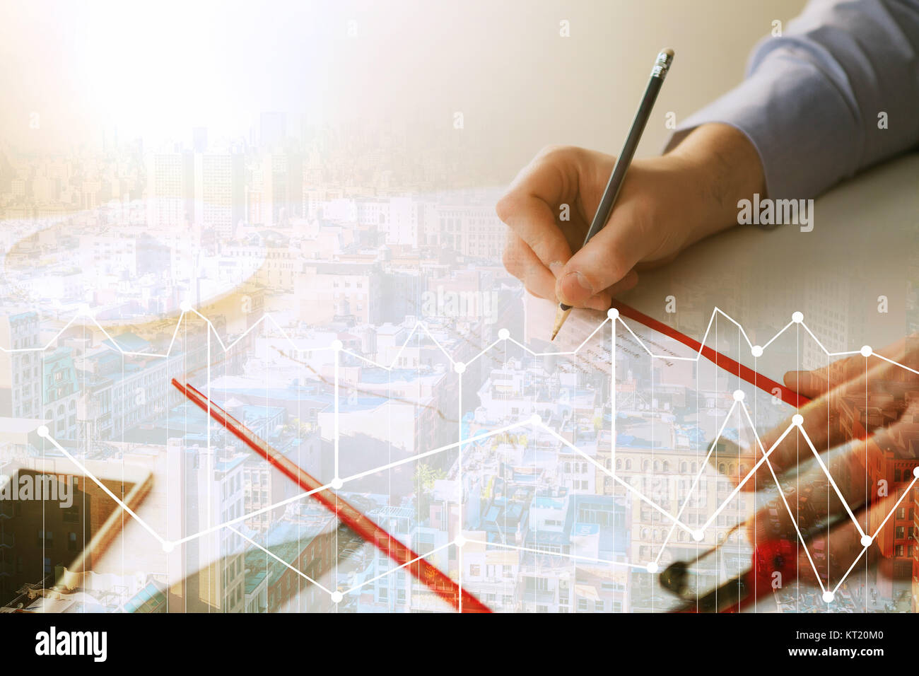 The male hand drawing a graph of growth Stock Photo - Alamy