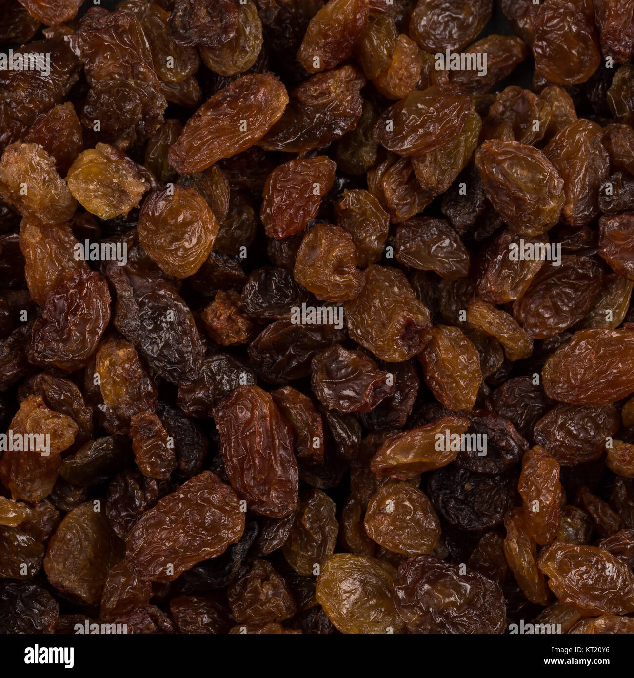 Sweet raisins background Stock Photo - Alamy