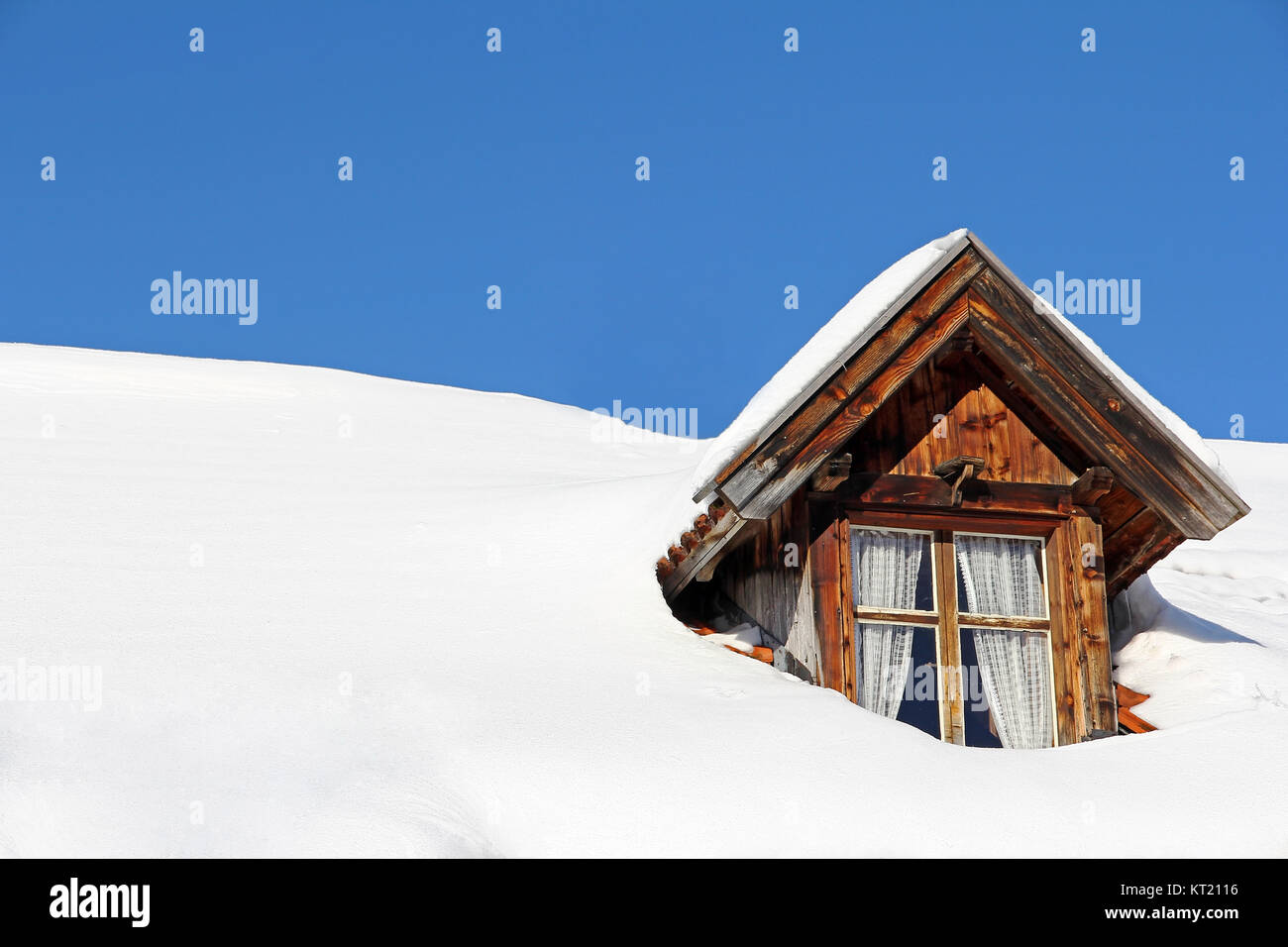 lots of snow on a house roof. a snowy house roof with skylight Stock ...