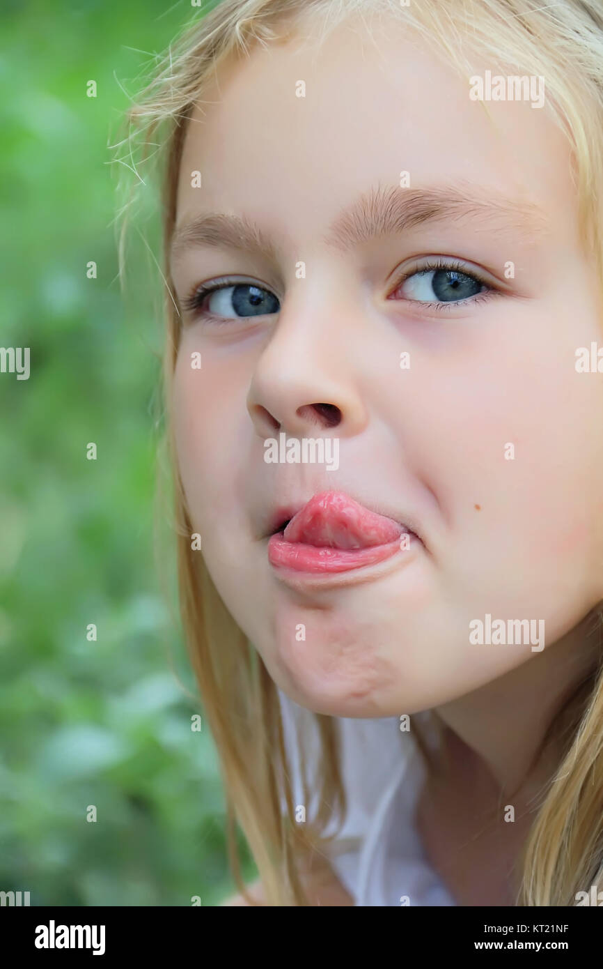 Small Girl With Put Out Tongue Stock Photo Alamy small-girl-with-put-out-tongue-stock-photo-alamy