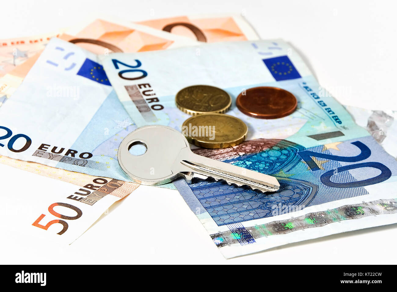 Key with money Stock Photo - Alamy