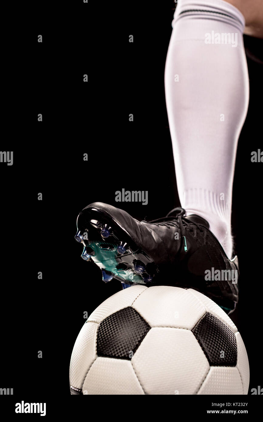 Foot on soccer ball Stock Photo - Alamy