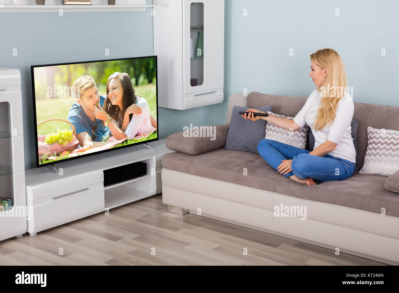 Woman Watching Television Stock Photo - Alamy