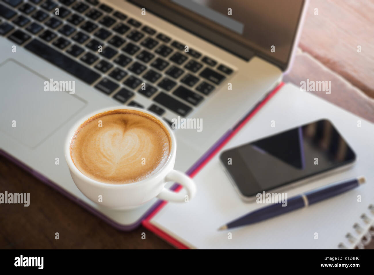 Coffee latte on work table Stock Photo - Alamy