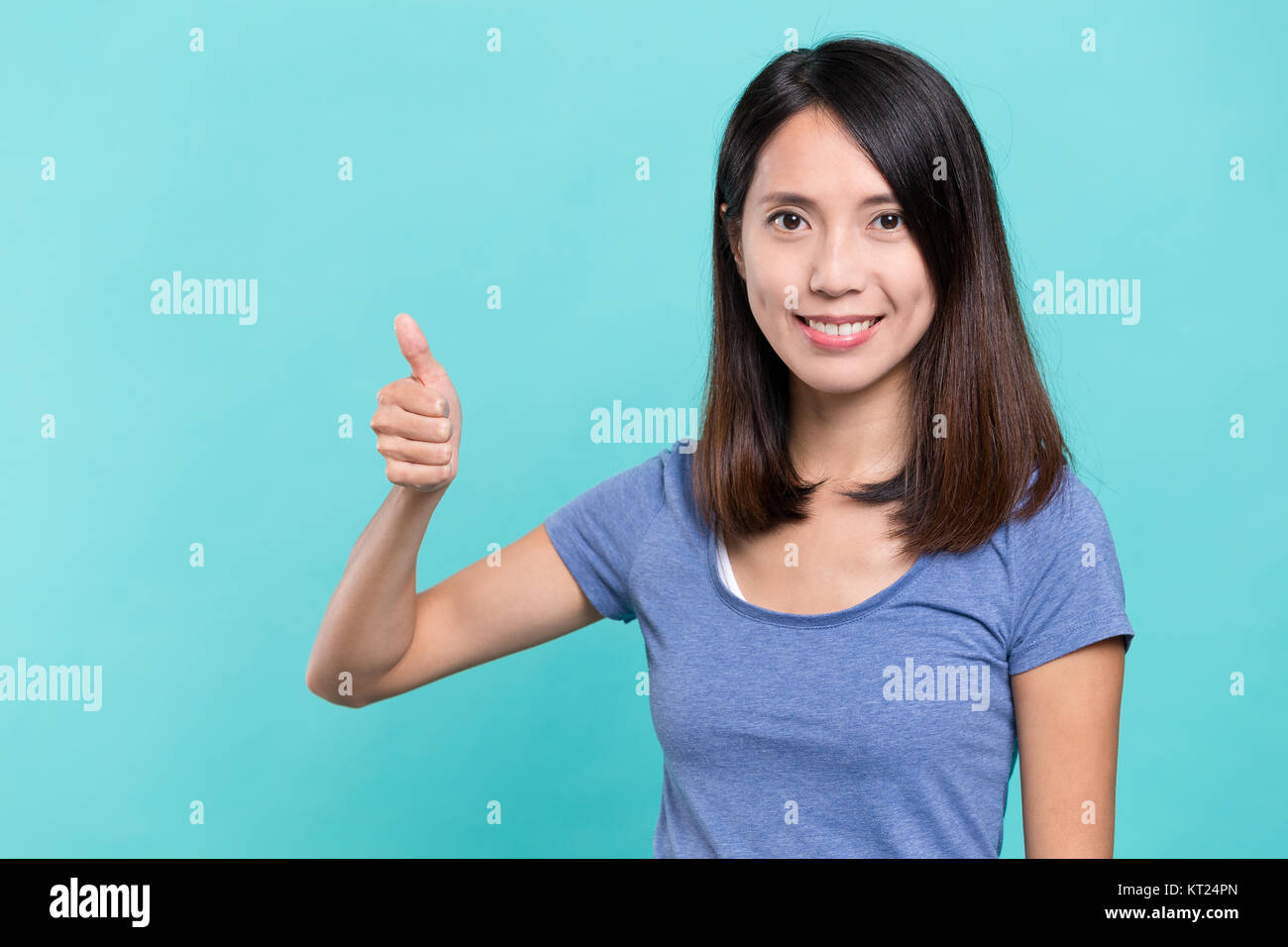 Woman showing finger up Stock Photo - Alamy
