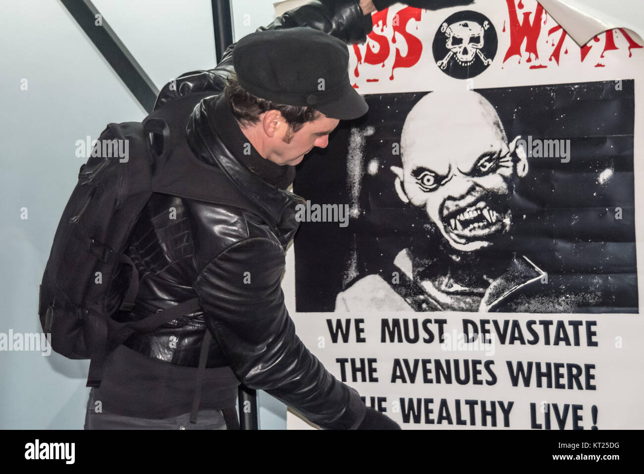 Class War's posters are put up with Blutak on the front of a currently ...