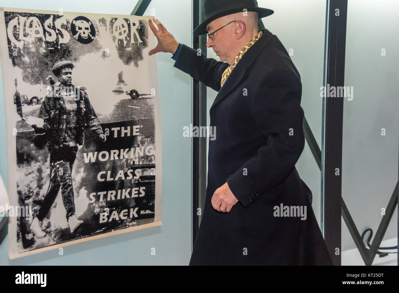 Ian Bone stands with Class War's'The Working Class Strikes Back' poster ...