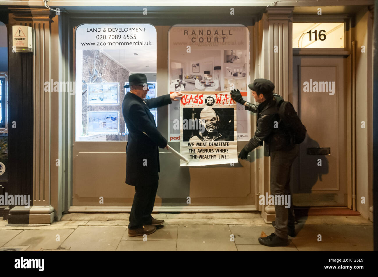 Ian Bone and Simon Elmer display the Class War poster 'We must ...