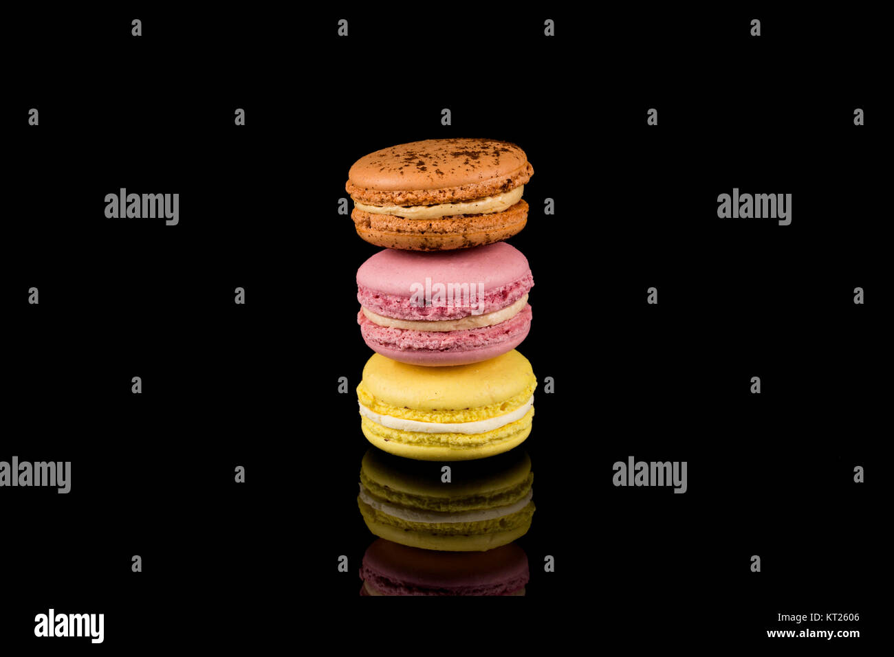 Colorful macaroon over black background Stock Photo - Alamy