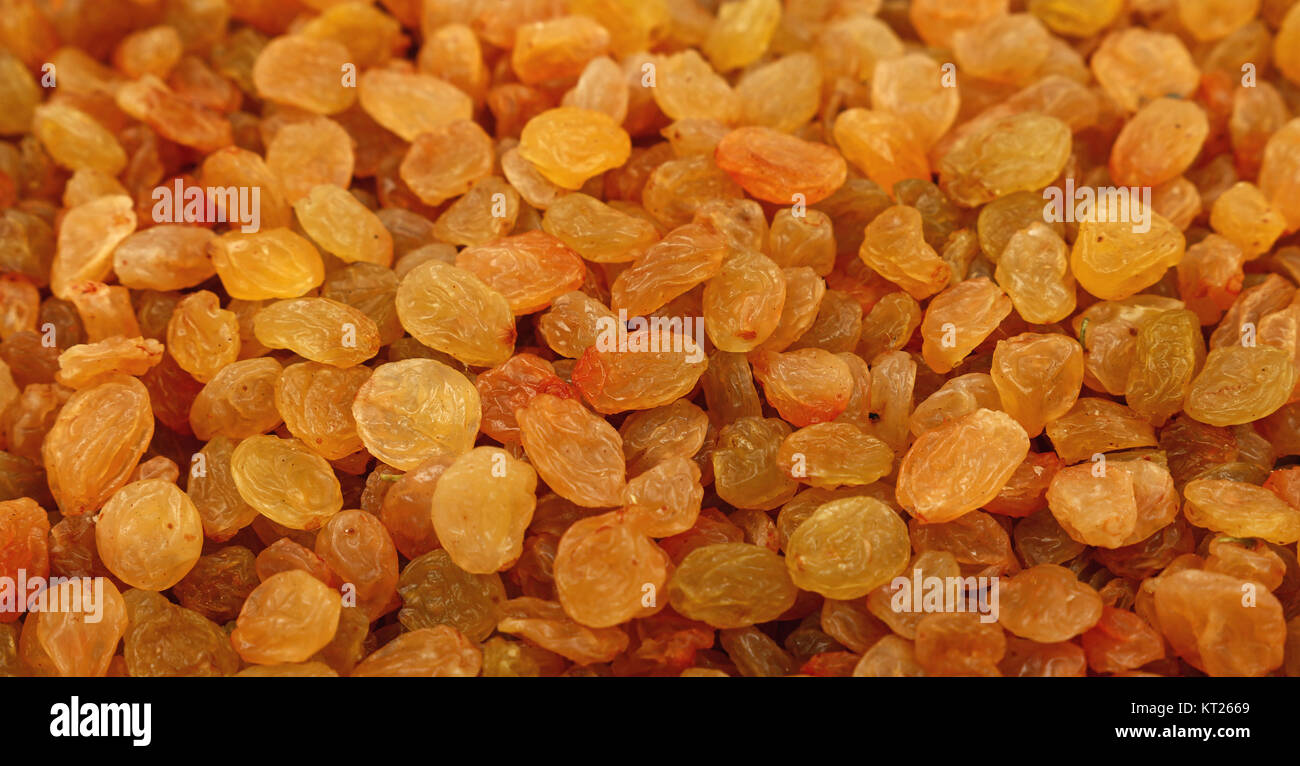 White grape small raisin close up low angle Stock Photo - Alamy