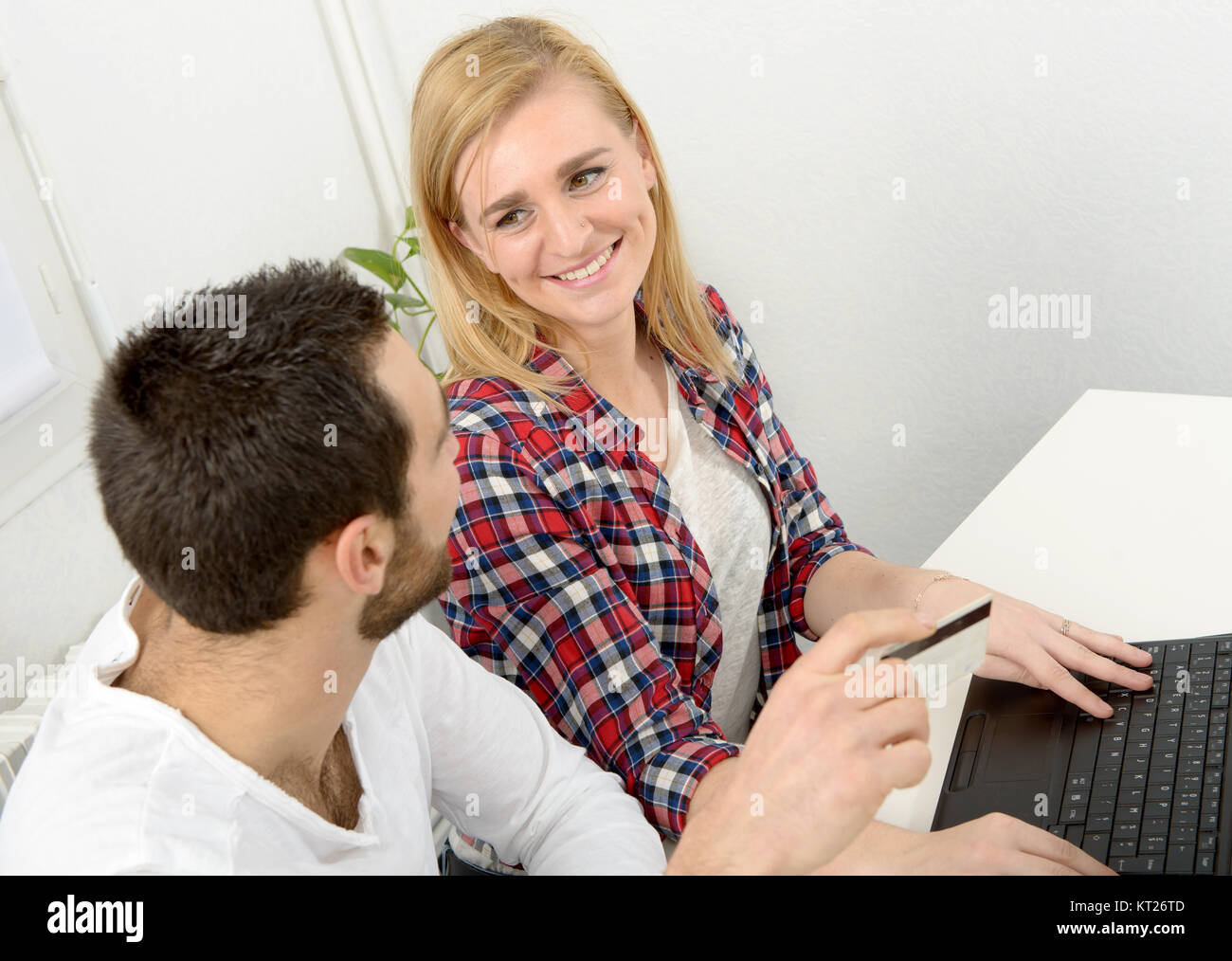 attractive man and woman business using laptop computer Stock Photo - Alamy