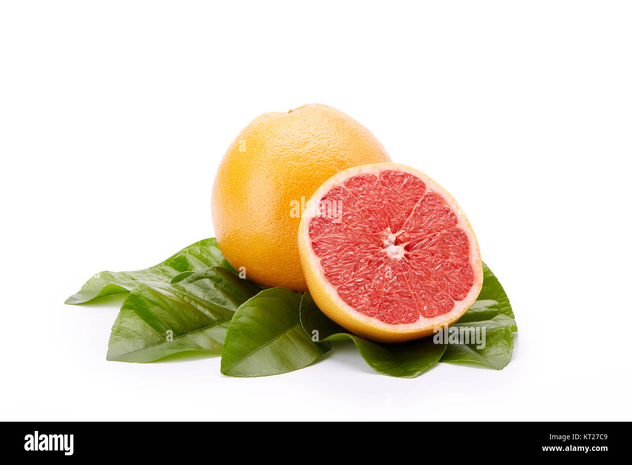 Ripe grapefruit on a white background Stock Photo - Alamy