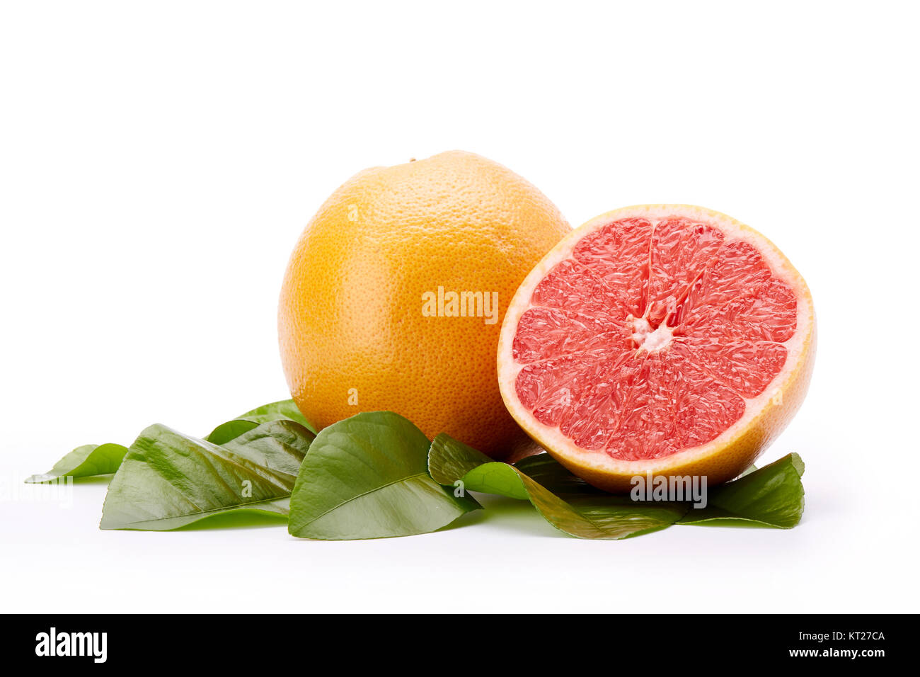 Ripe grapefruit on a white background Stock Photo - Alamy
