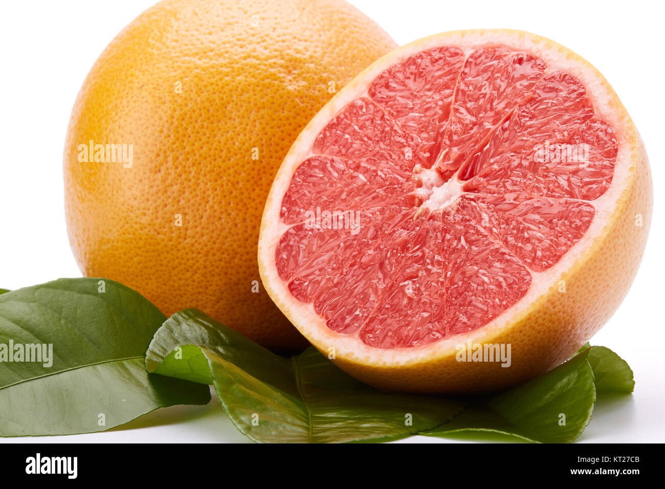 Ripe grapefruit on a white background Stock Photo - Alamy