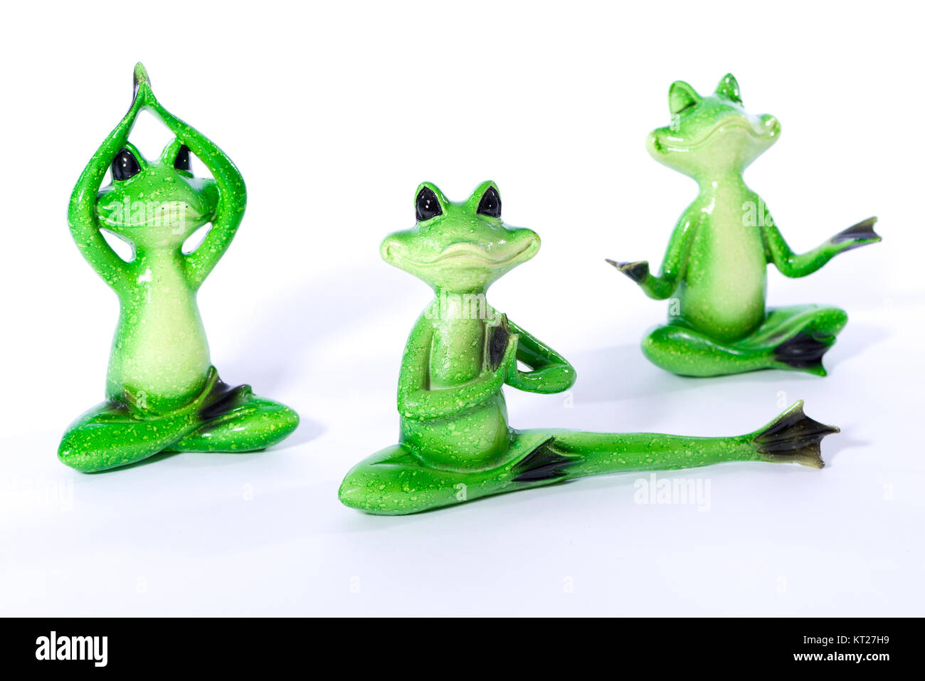 Group of green frog figures stretching and doing yoga exercises Stock ...