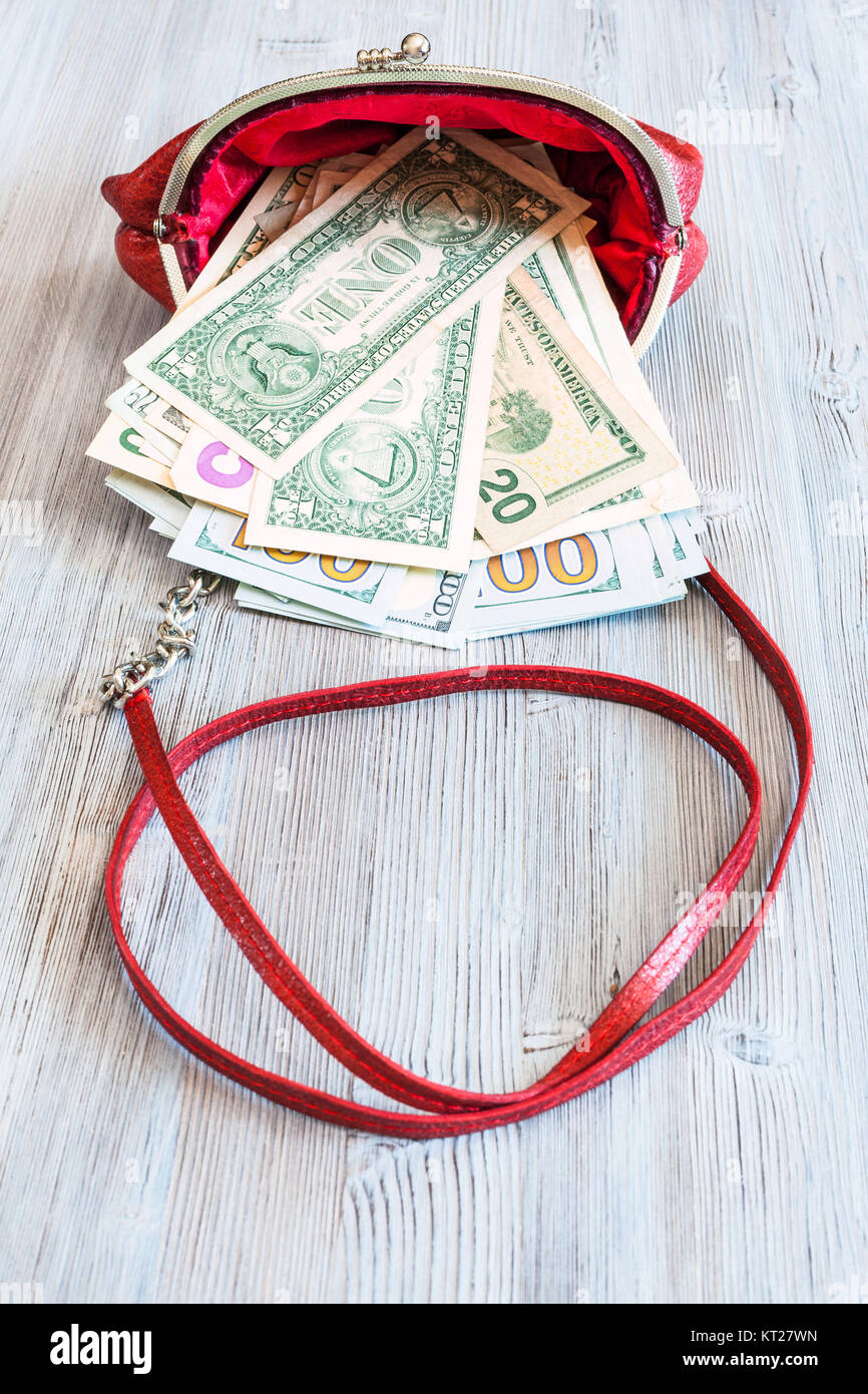 Money fall out of bag hi-res stock photography and images - Alamy