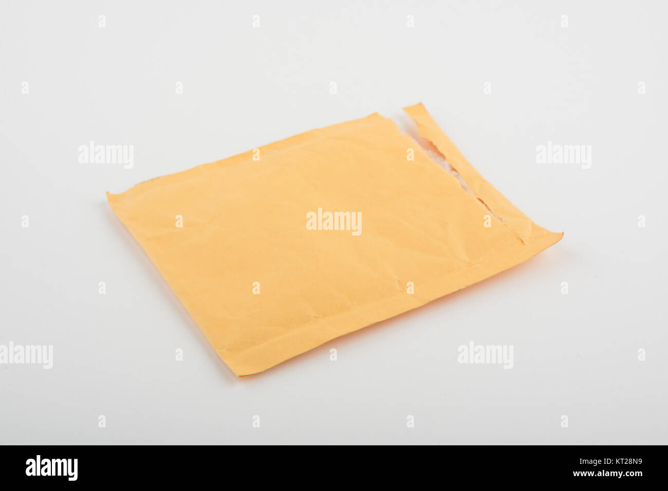 Open used yellow envelope isolated on white background Stock Photo - Alamy