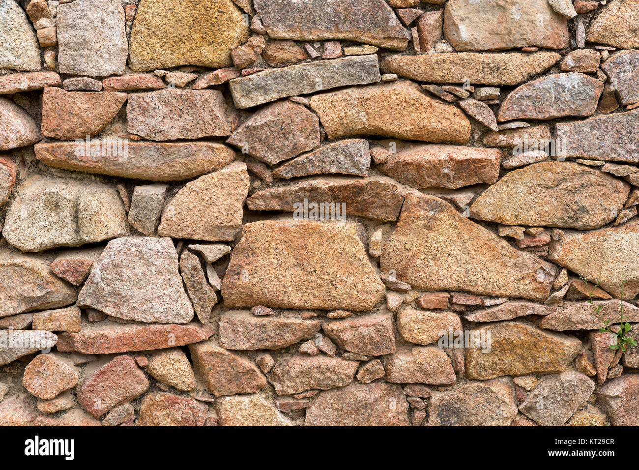 Closeup of a stone wall for backgroung Stock Photo - Alamy