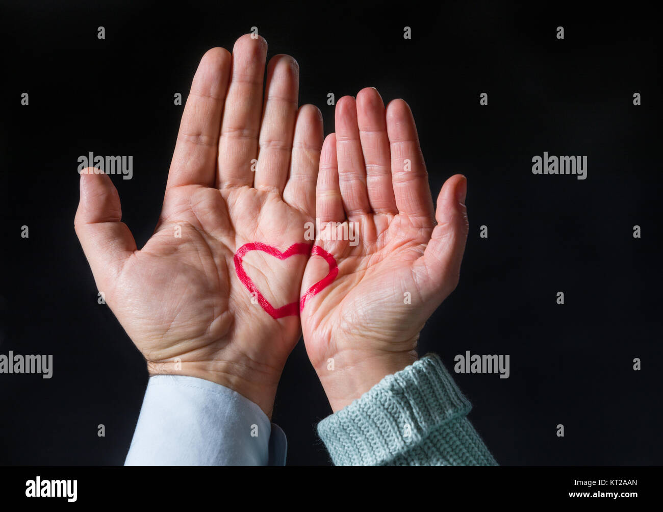 Hands with heart symbol Stock Photo - Alamy