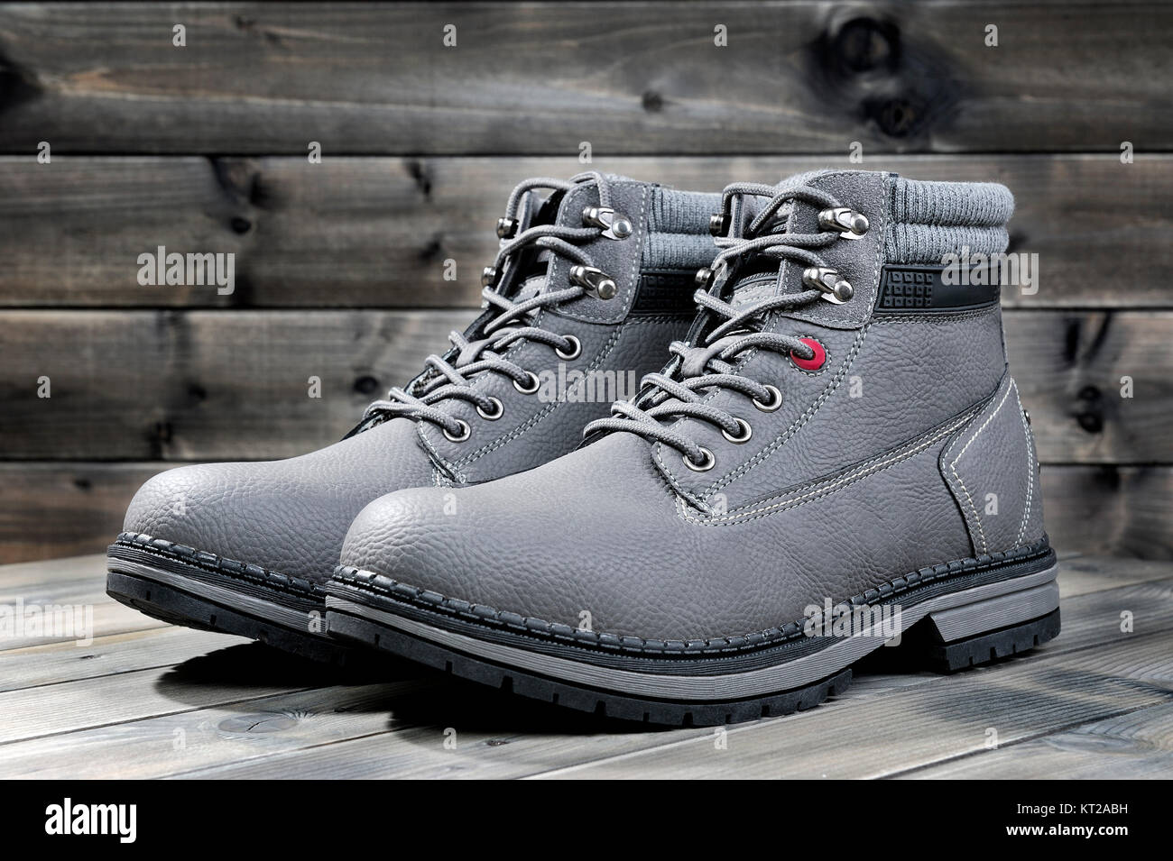 Closeup of winter men's shoes photographed on a background old wood ...