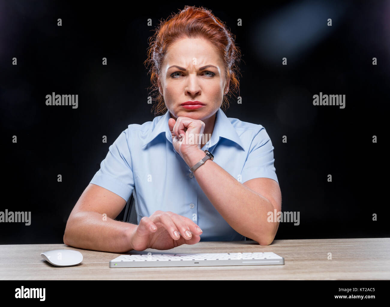 Angry woman with keyboard Stock Photo - Alamy