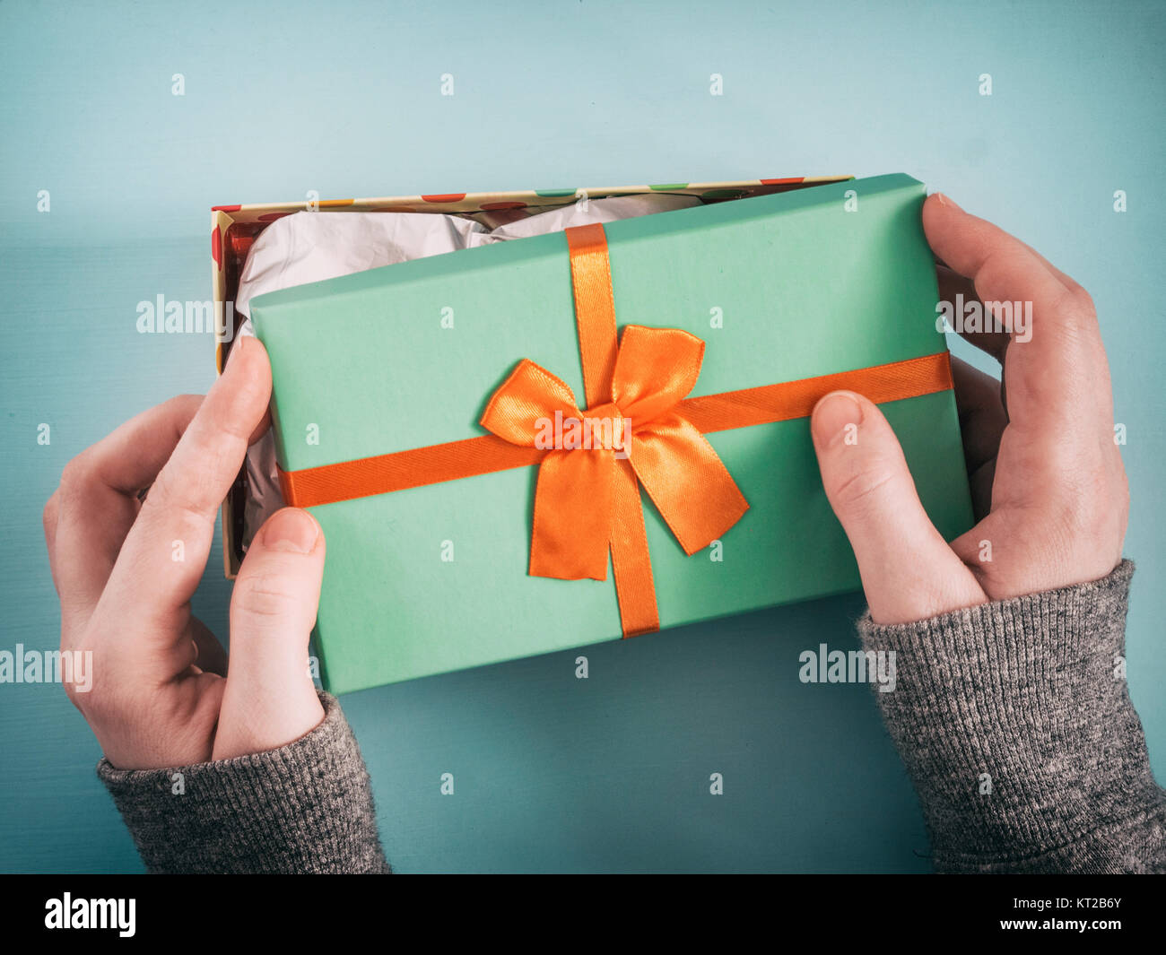 female hands opening gift box Stock Photo - Alamy