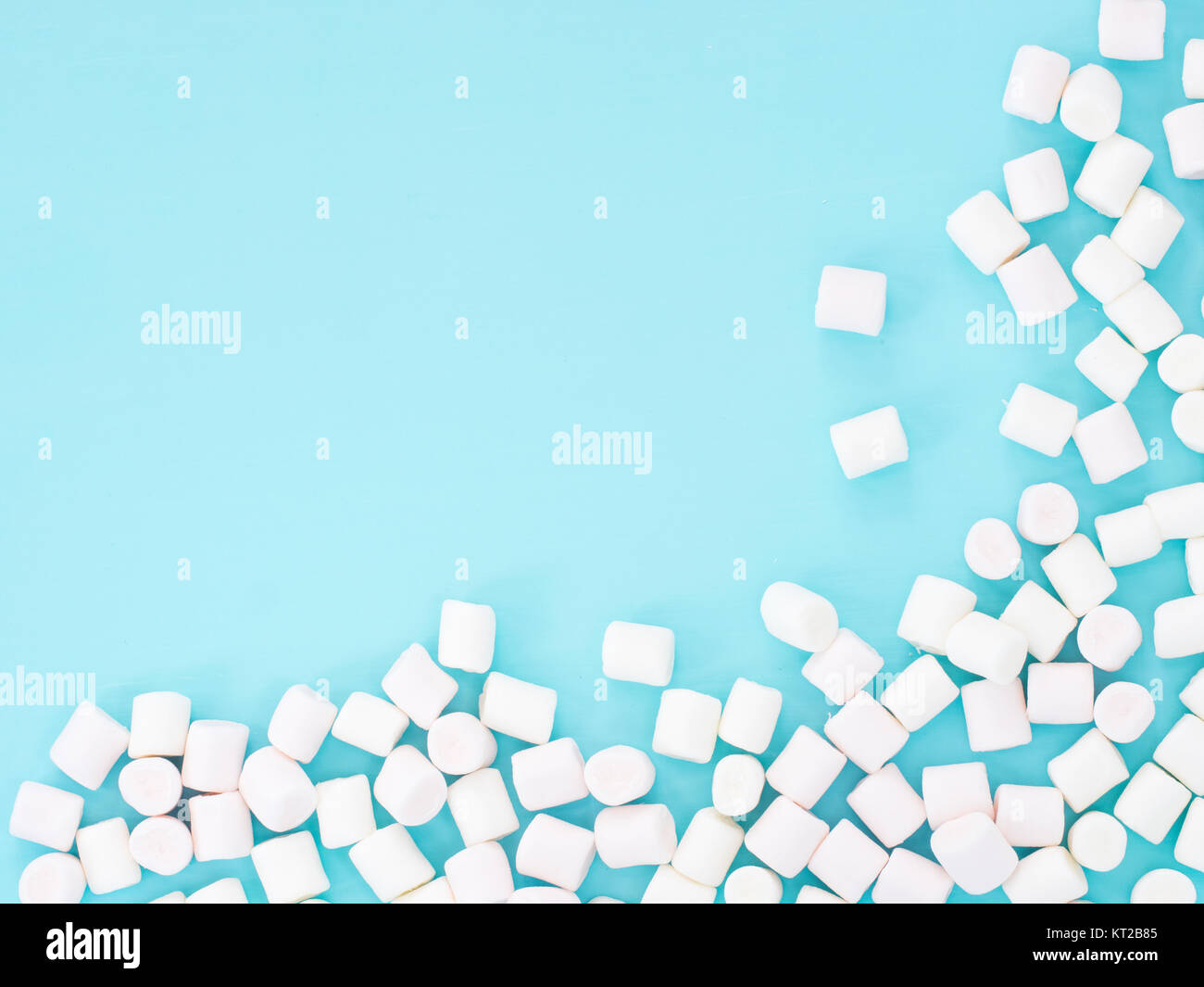 Marshmallows on blue Stock Photo - Alamy