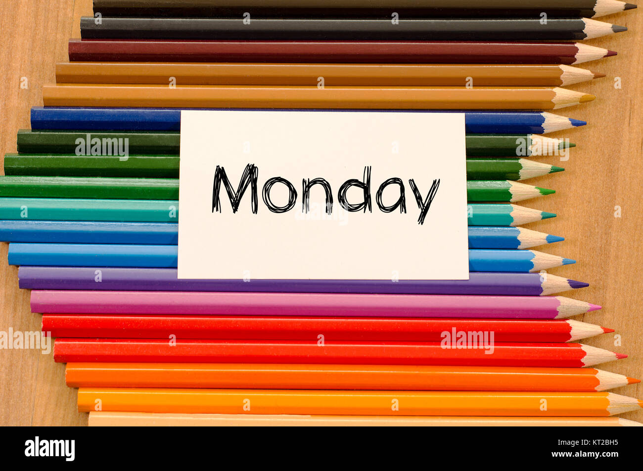 Monday text concept over white note Stock Photo - Alamy