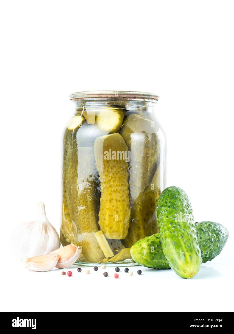 Pickles in glass jar isolated on white Stock Photo - Alamy