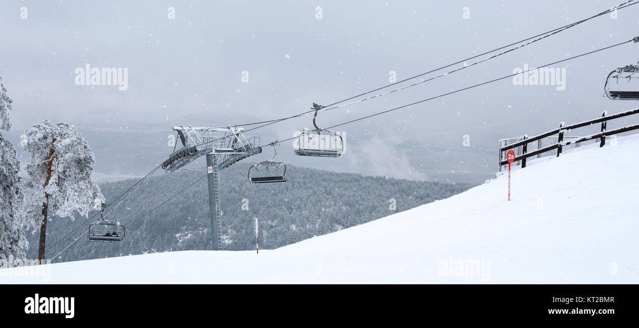 mountains with modern ski lift chair in winter Stock Photo - Alamy