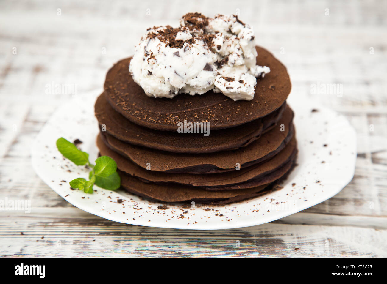 Chocolate pancake with icecream on a light background Stock Photo - Alamy