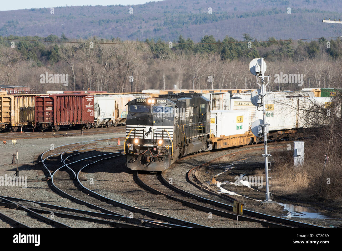 A Norfolk Southern freight train passing through a rail yard Stock ...