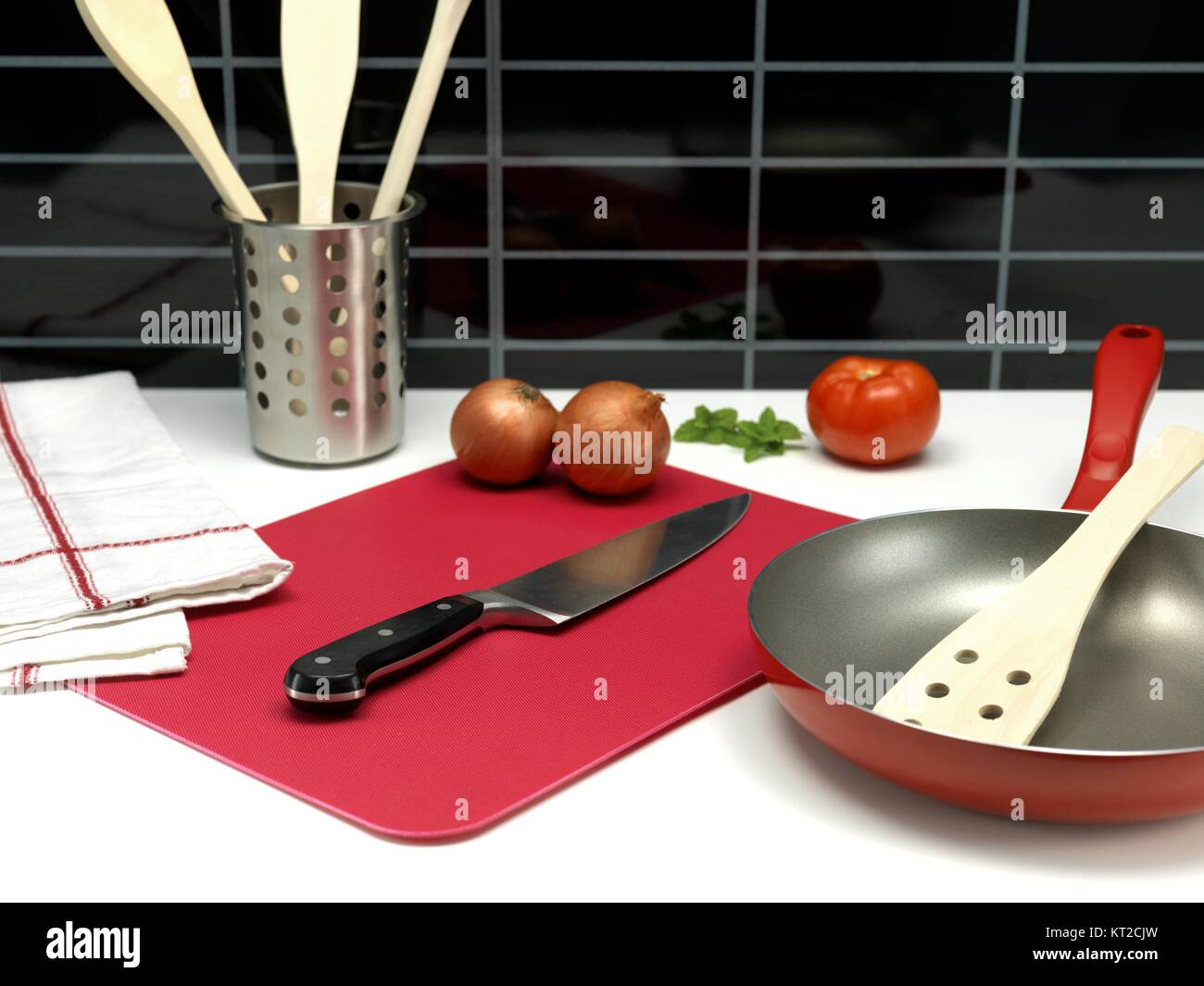A chopping board on a kitchen bench Stock Photo - Alamy