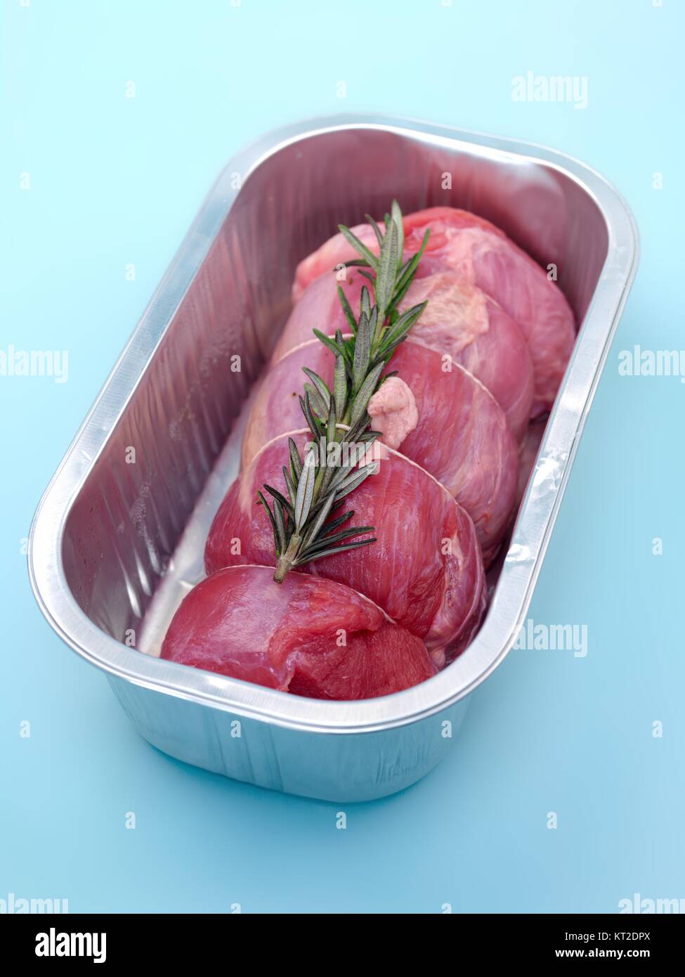 Raw mini veal roast rolled ready for roasting Stock Photo - Alamy