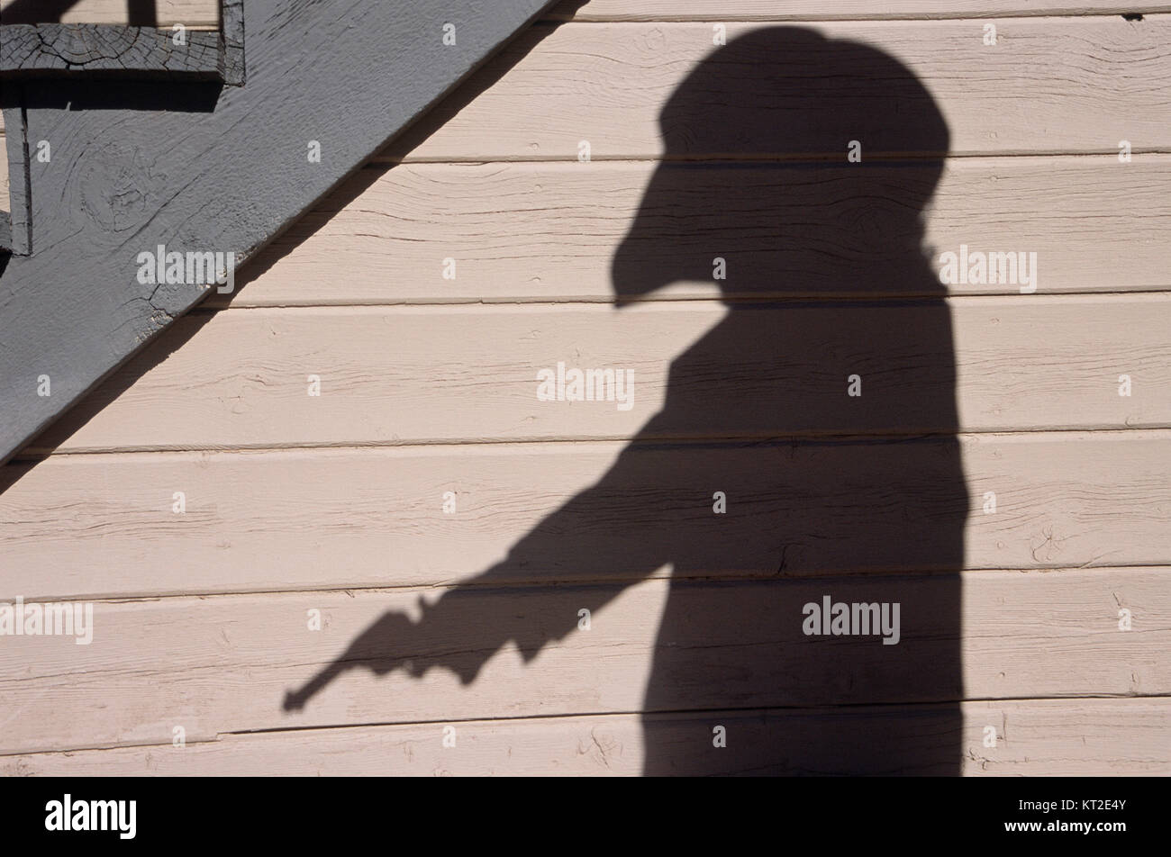 Shadow gun hi-res stock photography and images - Alamy