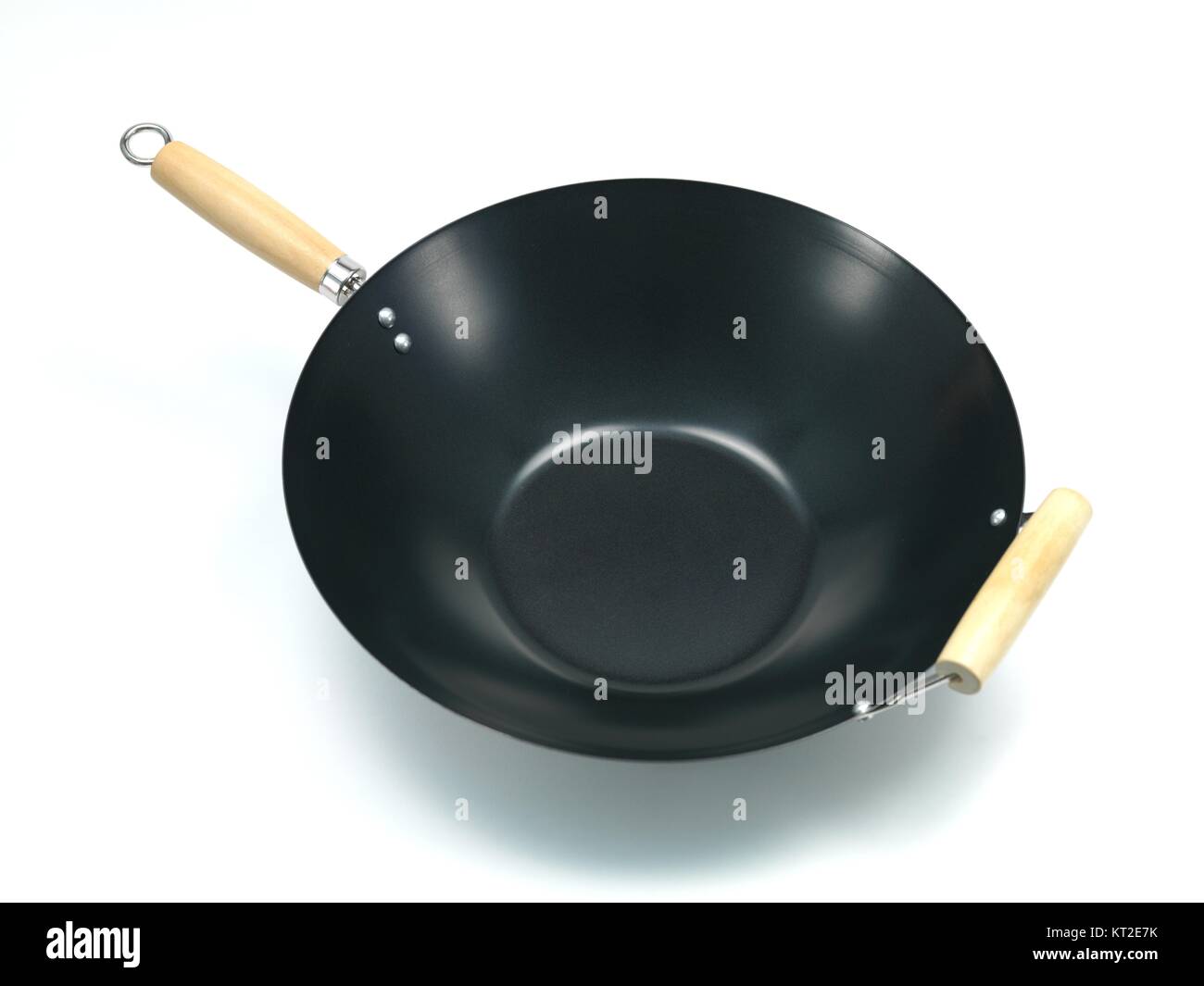 A wok isolated against a white background Stock Photo - Alamy