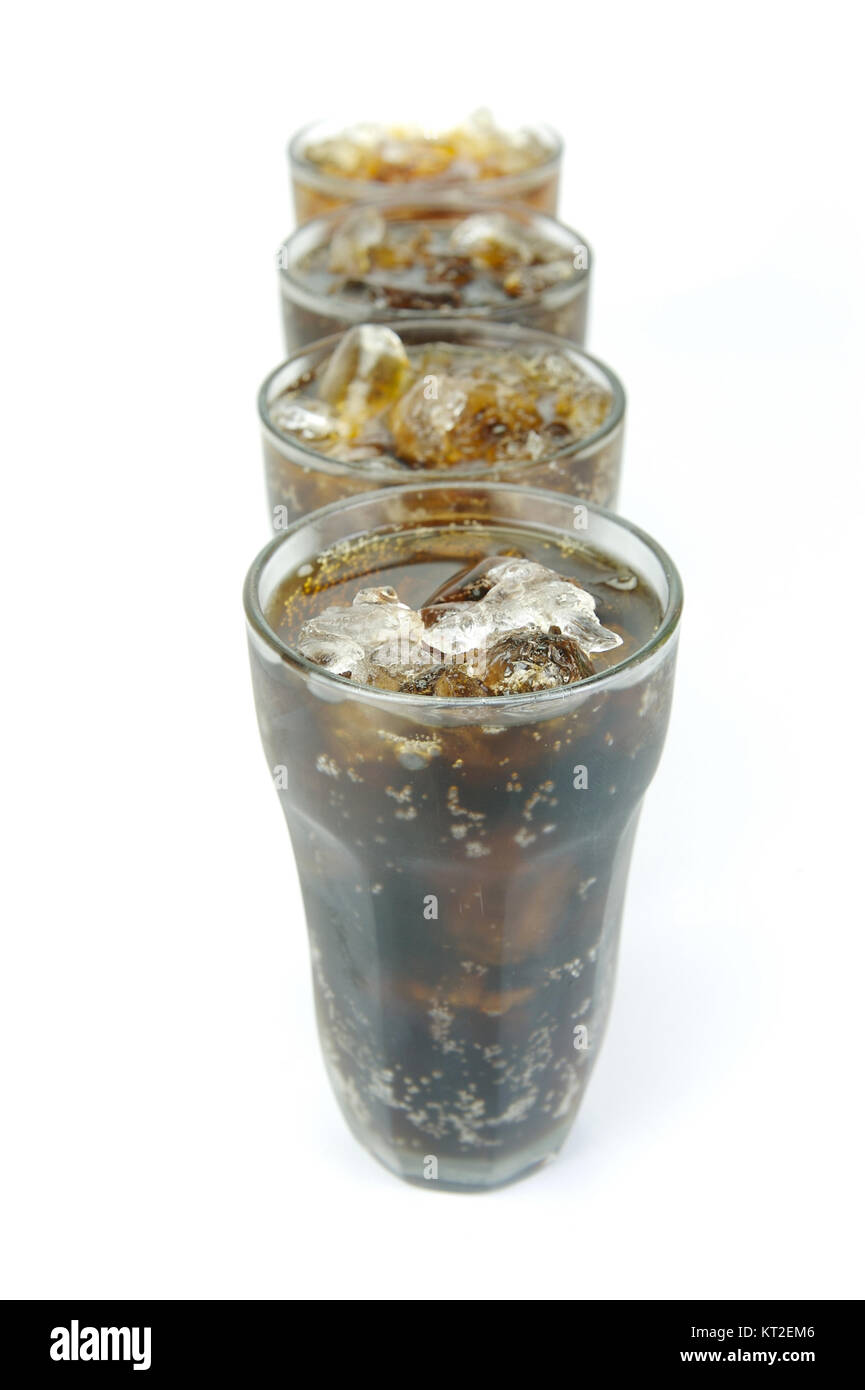 Glasses of cola isolated against a white background Stock Photo - Alamy