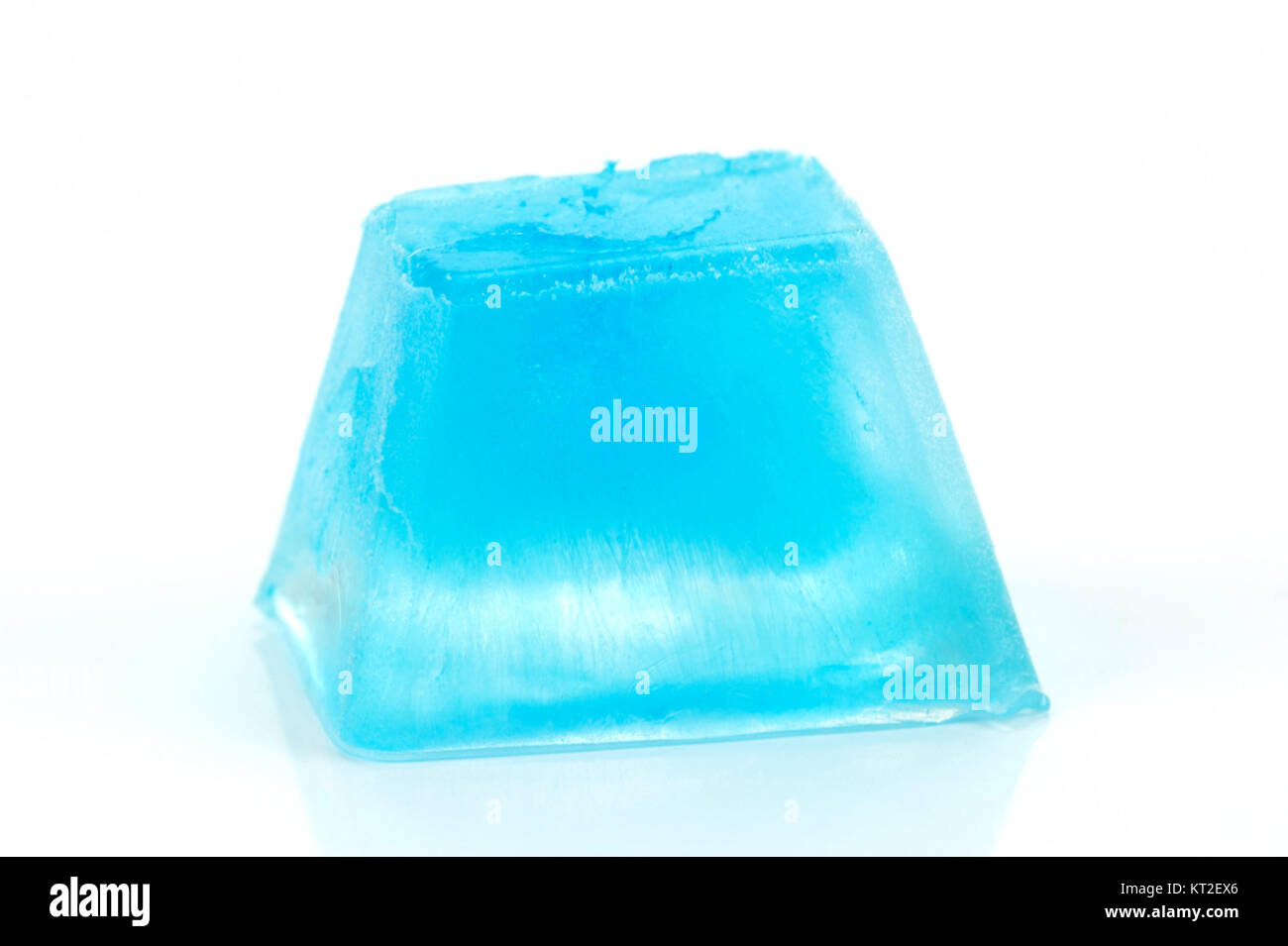 Blue ice blocks isolated against a white background Stock Photo - Alamy