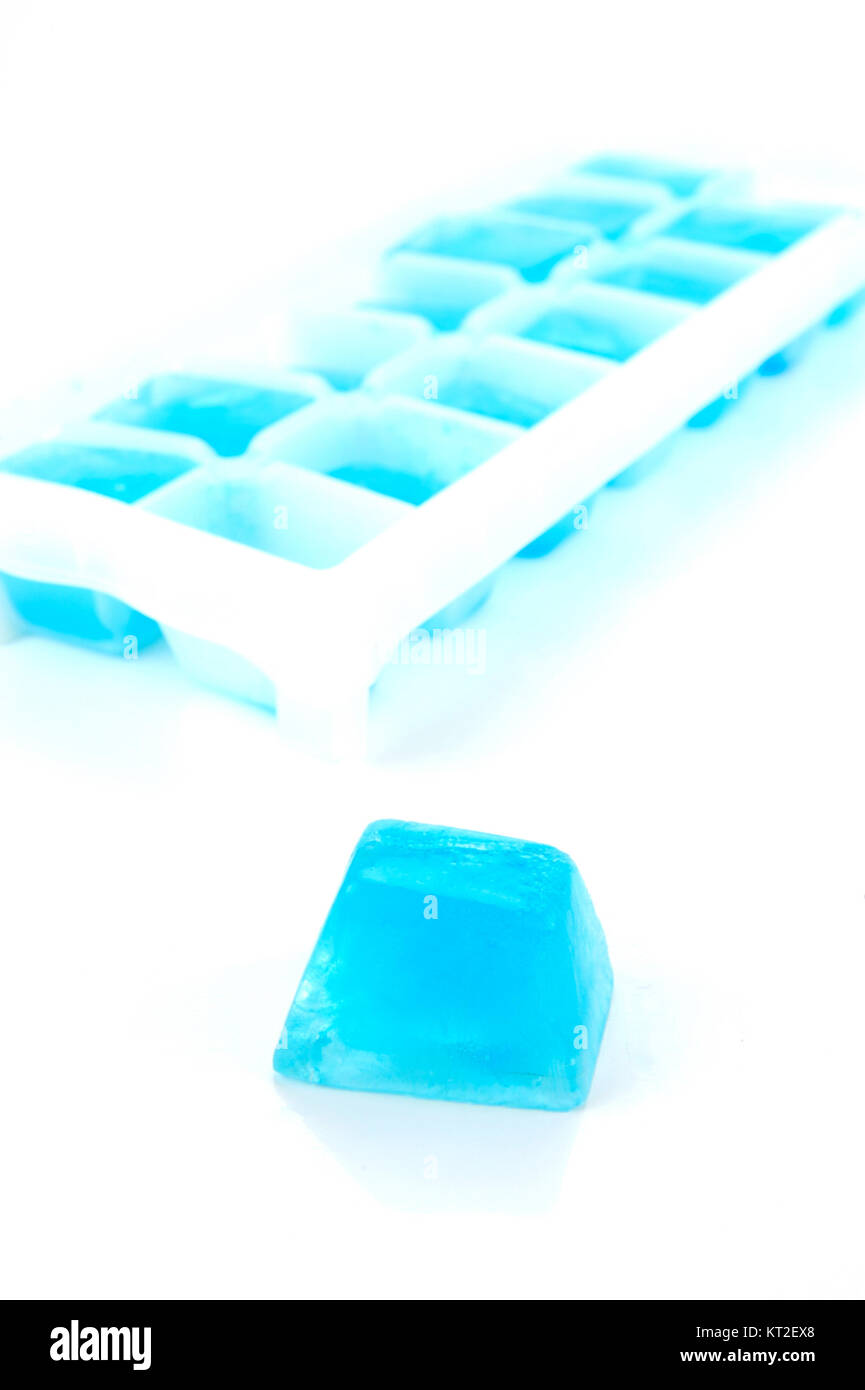 Blue ice blocks isolated against a white background Stock Photo - Alamy