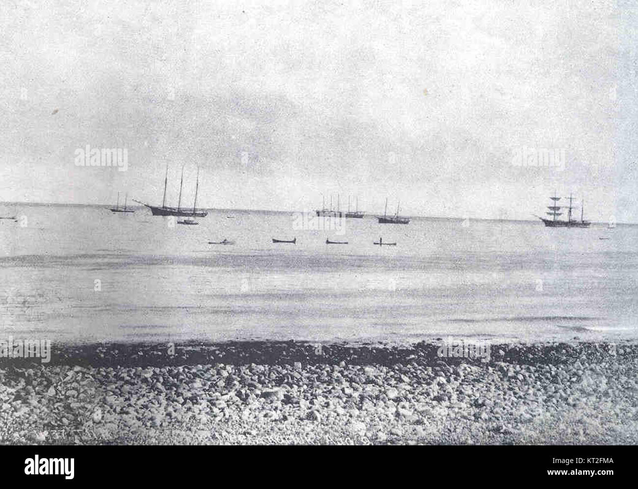 This historical image captures a fleet of salmon vessels in Karluk Bay ...
