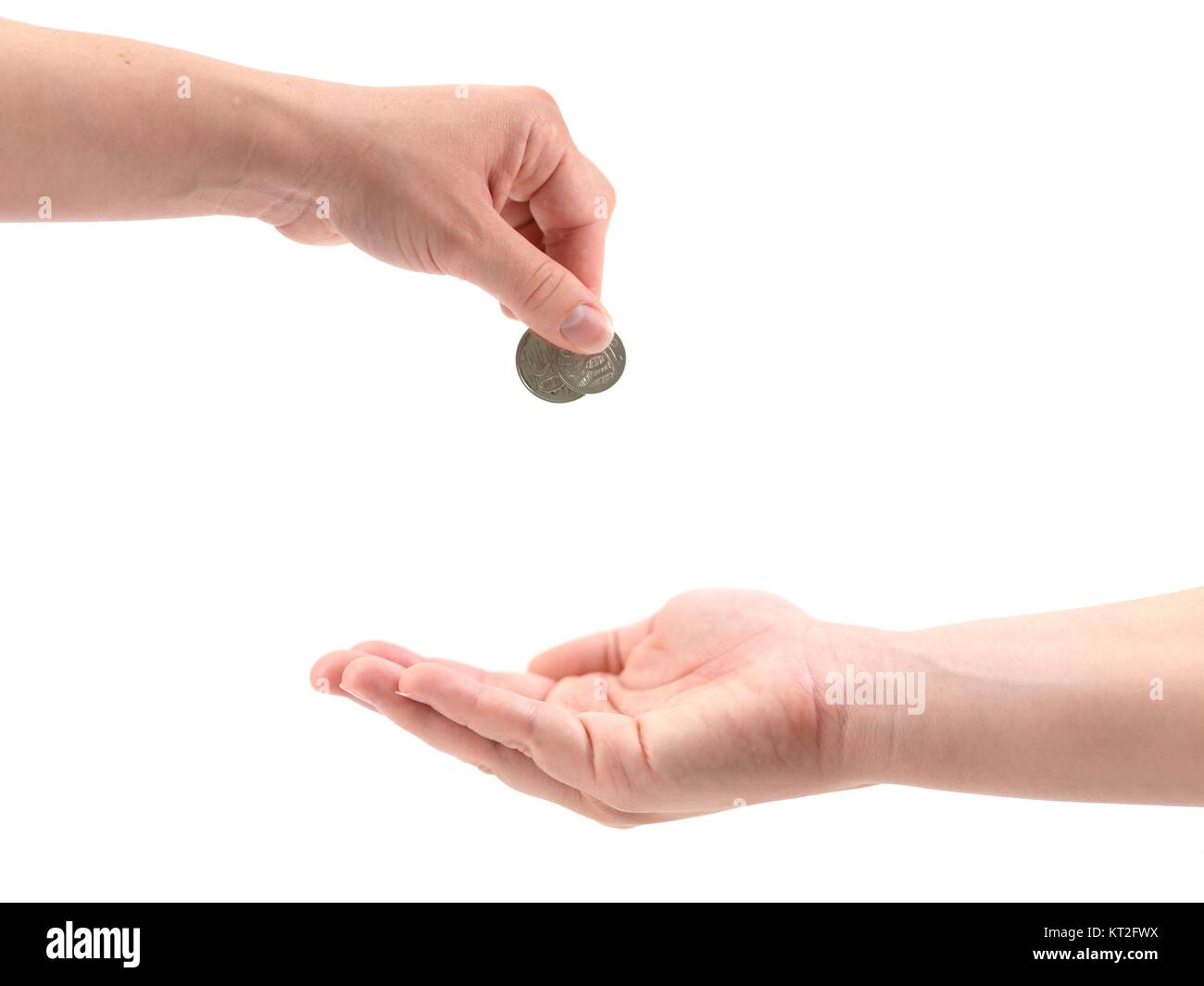 A female hand with coin isolated against a white background Stock Photo ...