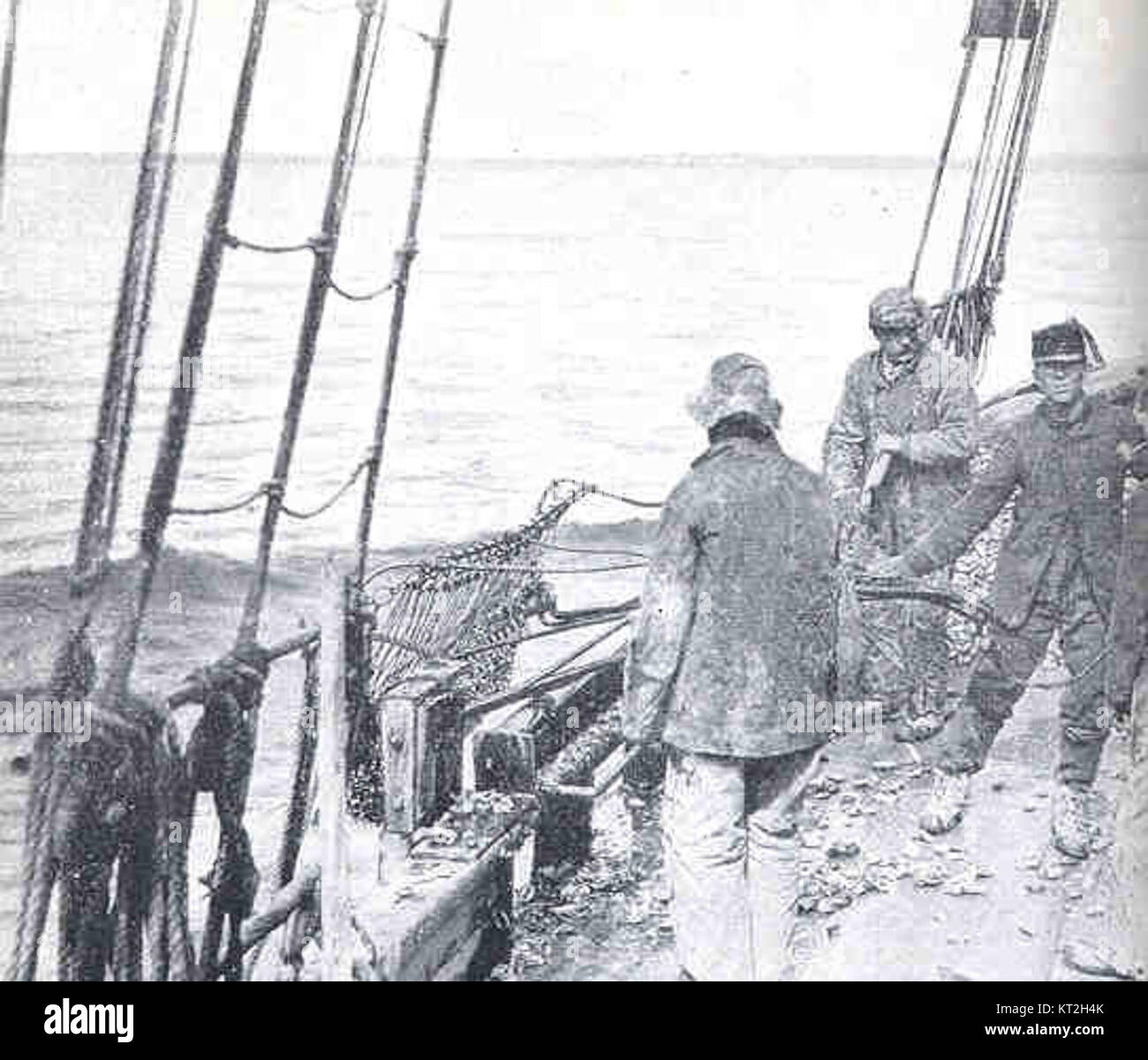 The operation involves lowering a dredge to extract material from ...