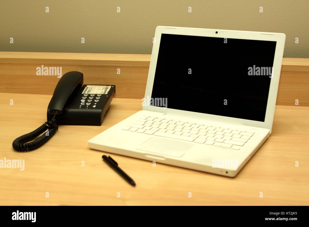 An office desk with office items in a work place scene Stock Photo - Alamy